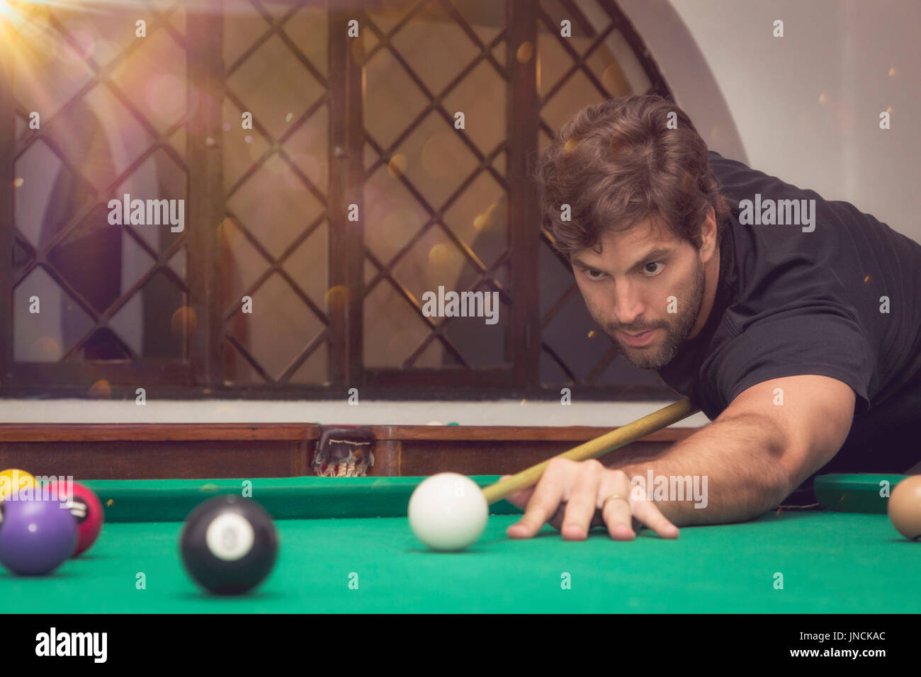 Man playing billiards green billiard hi-res stock photography and ...