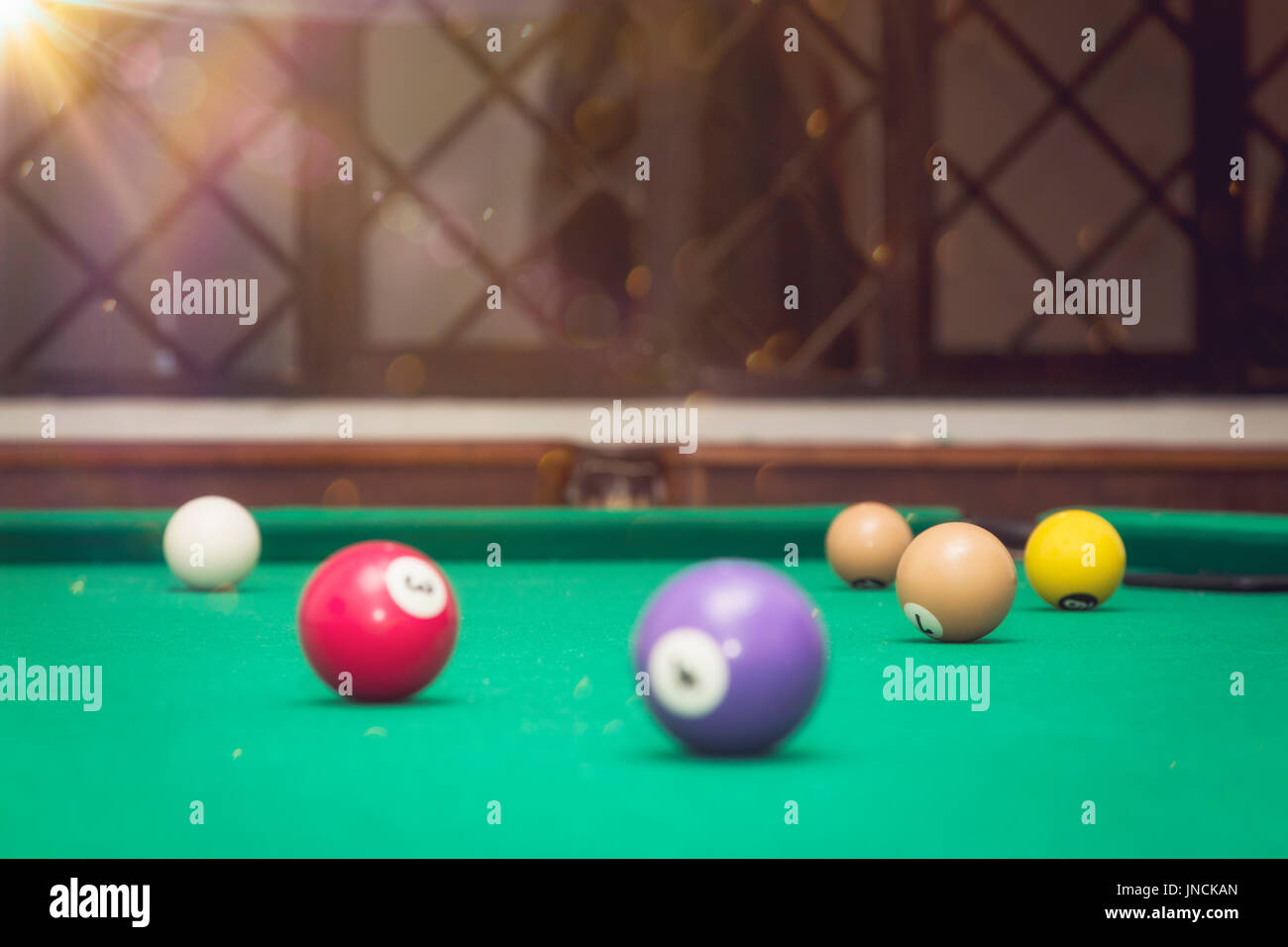 Billiard Balls in a pool table Stock Photo - Alamy