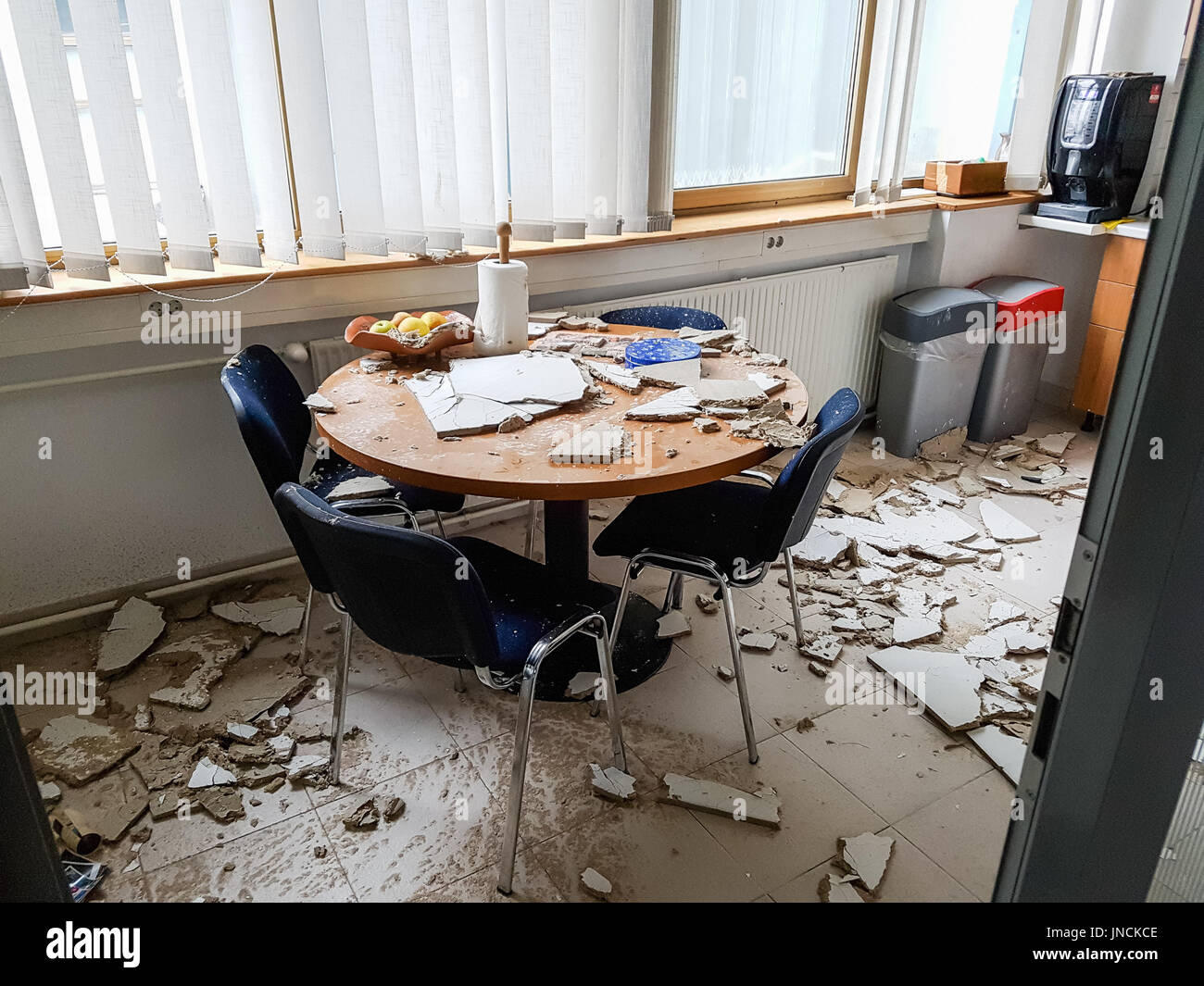Ruined kitchen by collapsed ceiling Stock Photo - Alamy