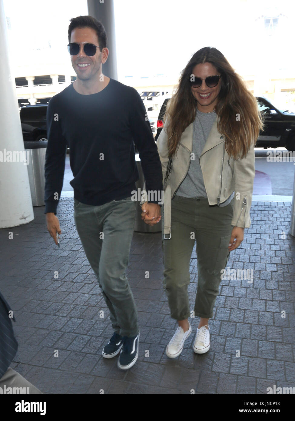 Eli Roth and his wife Lorenza Izzo arrive at Los Angeles International ...