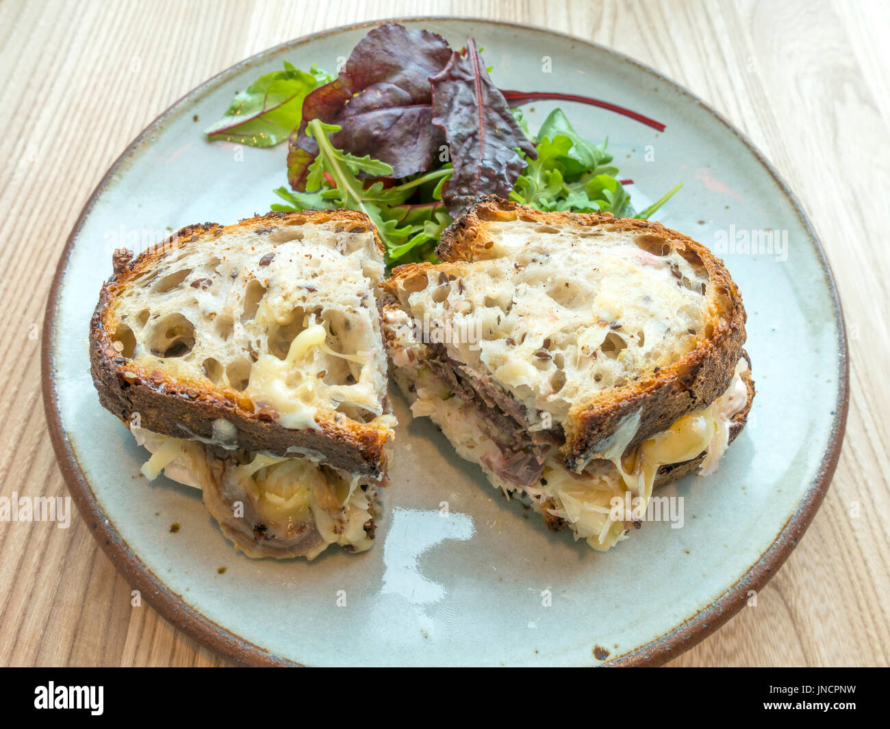 Salt beef Reuben Sandwich on sourdough bread with salad garnish Stock ...