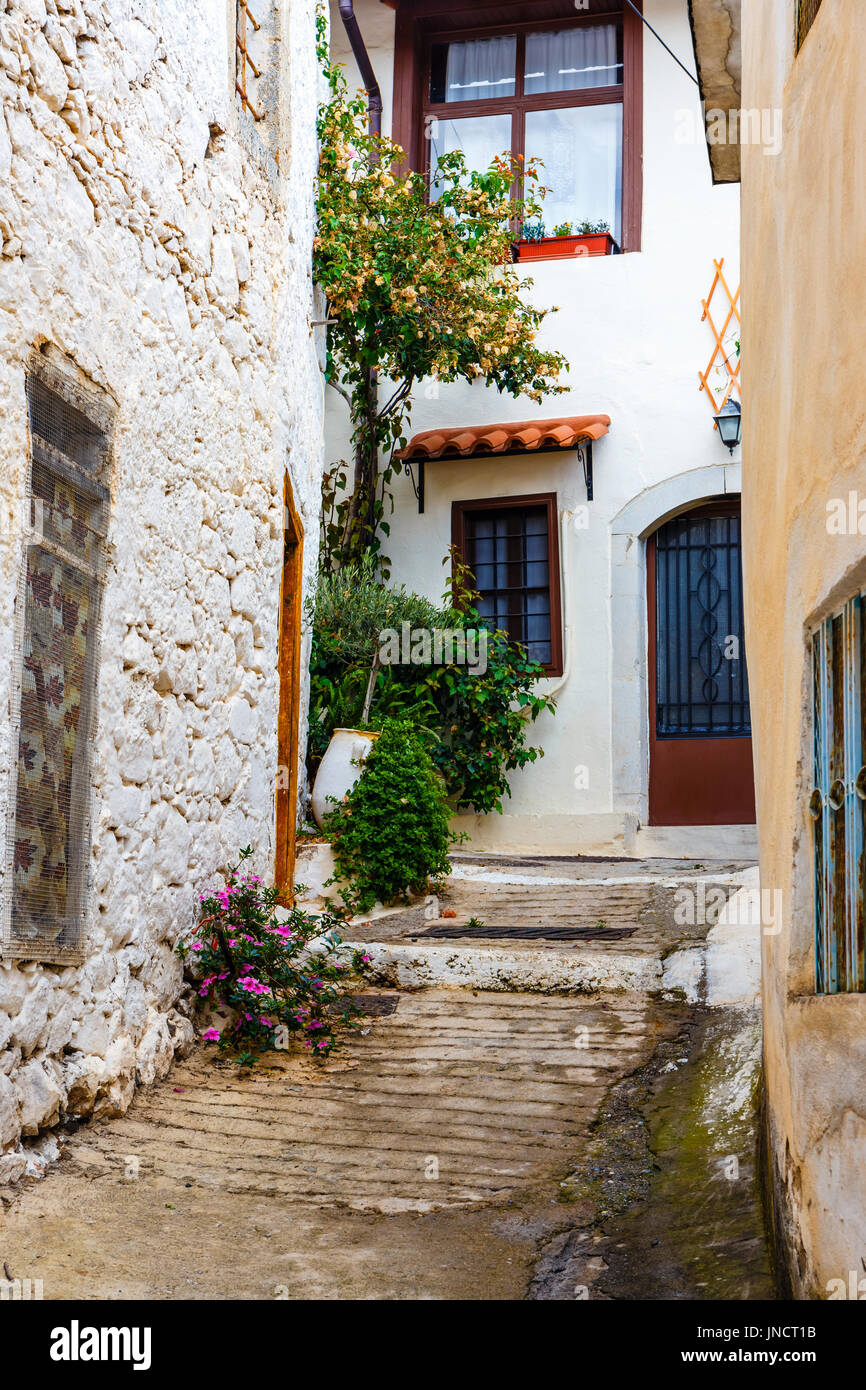 Narrow street in the village of Kritsa near Agios Nikolaos, Crete ...