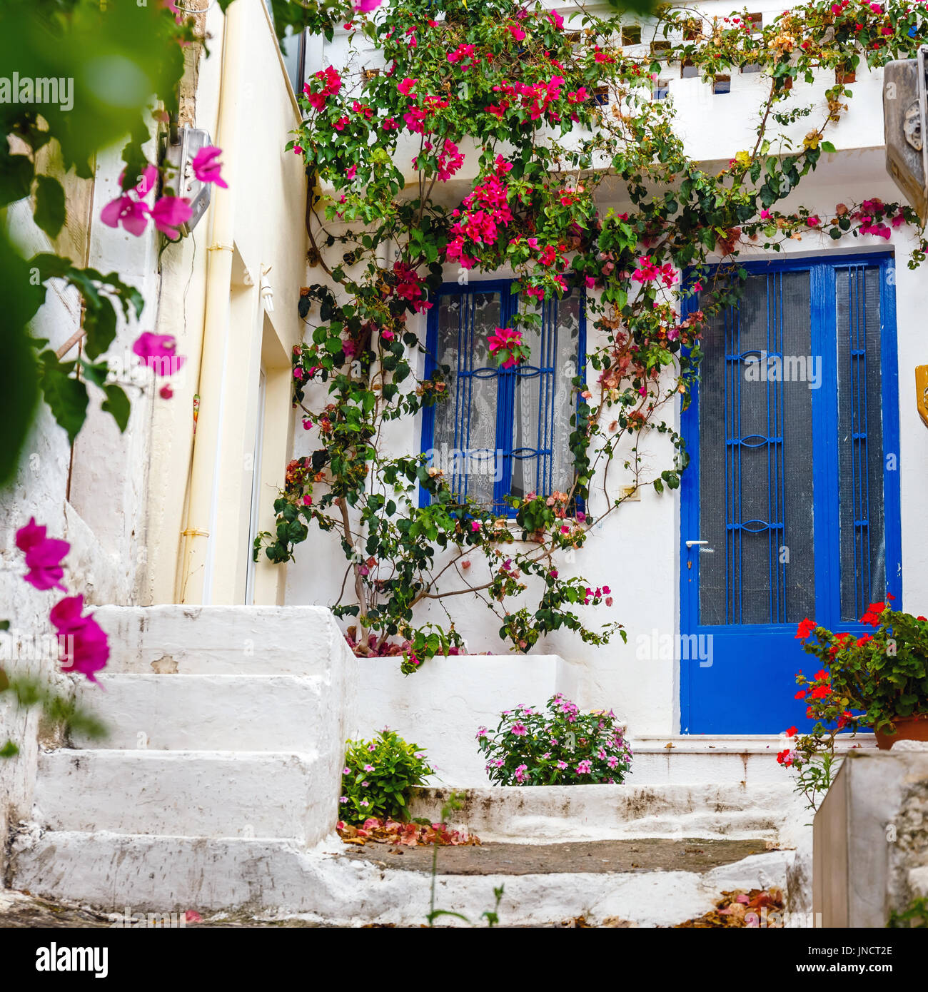 Narrow street in the village of Kritsa near Agios Nikolaos, Crete ...