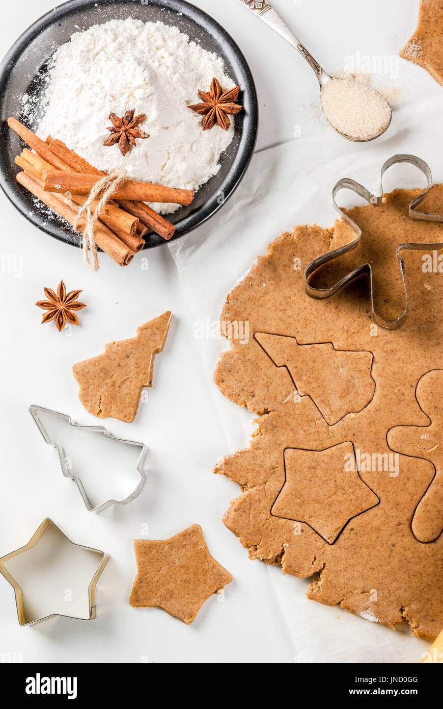 Christmas baking. Ginger dough for gingerbread, gingerbread men, stars ...
