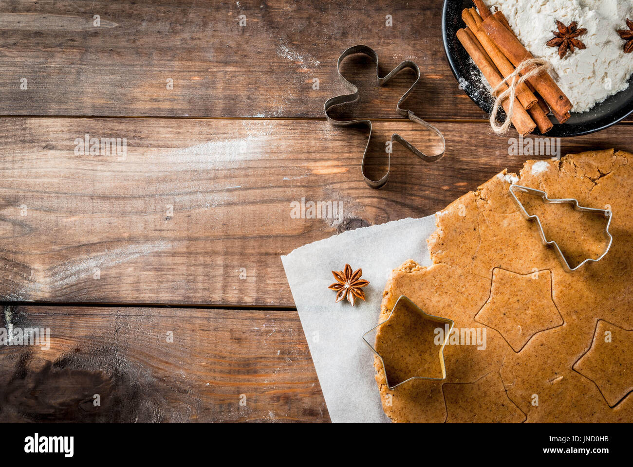 Christmas baking. Ginger dough for gingerbread, gingerbread men, stars ...