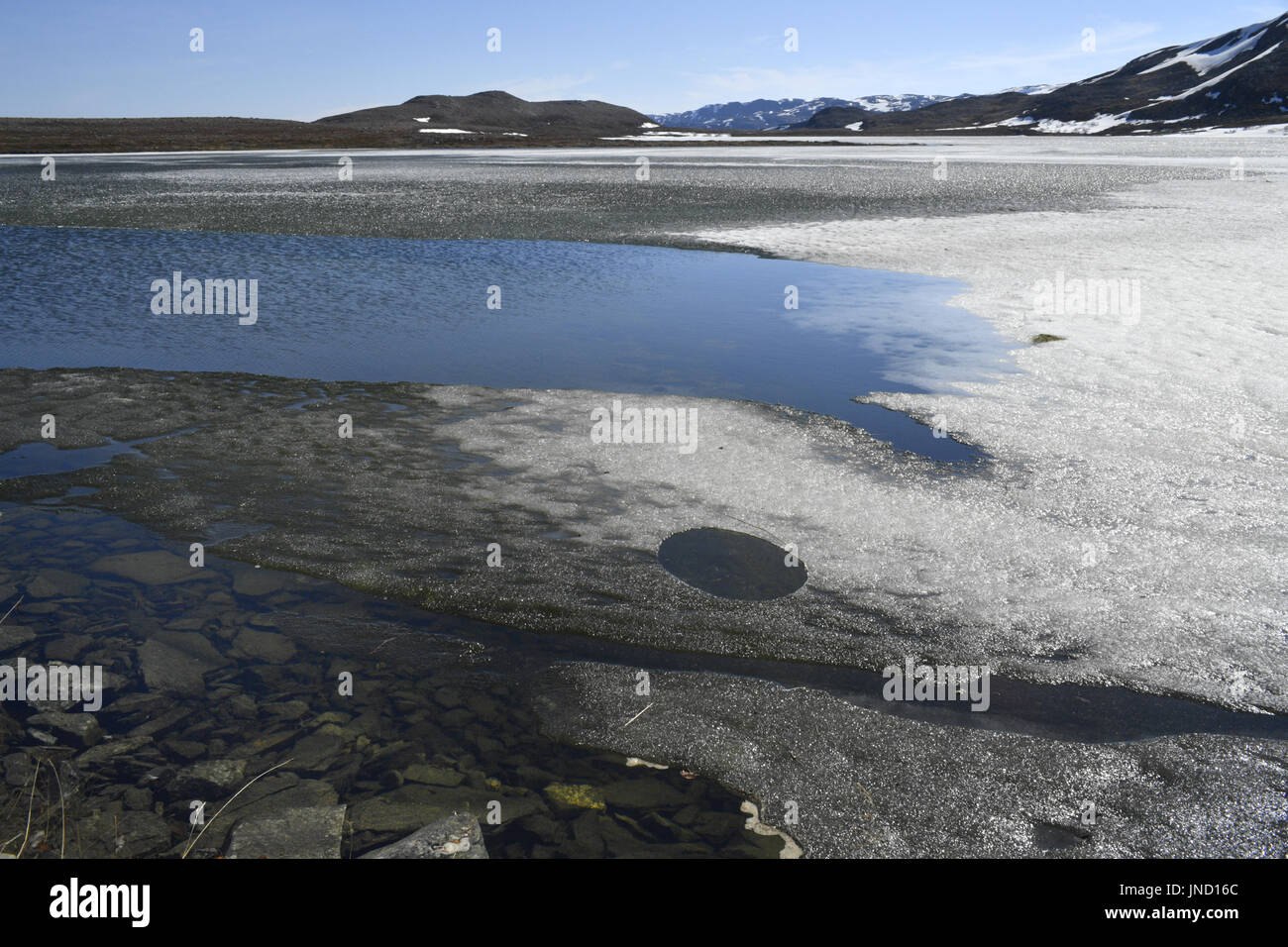 Ice-covered lake - Arctic Norway Stock Photo - Alamy