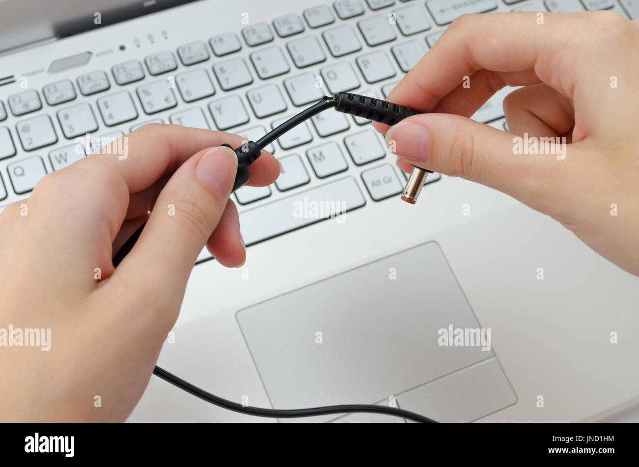 Broken charger hi-res stock photography and images - Alamy