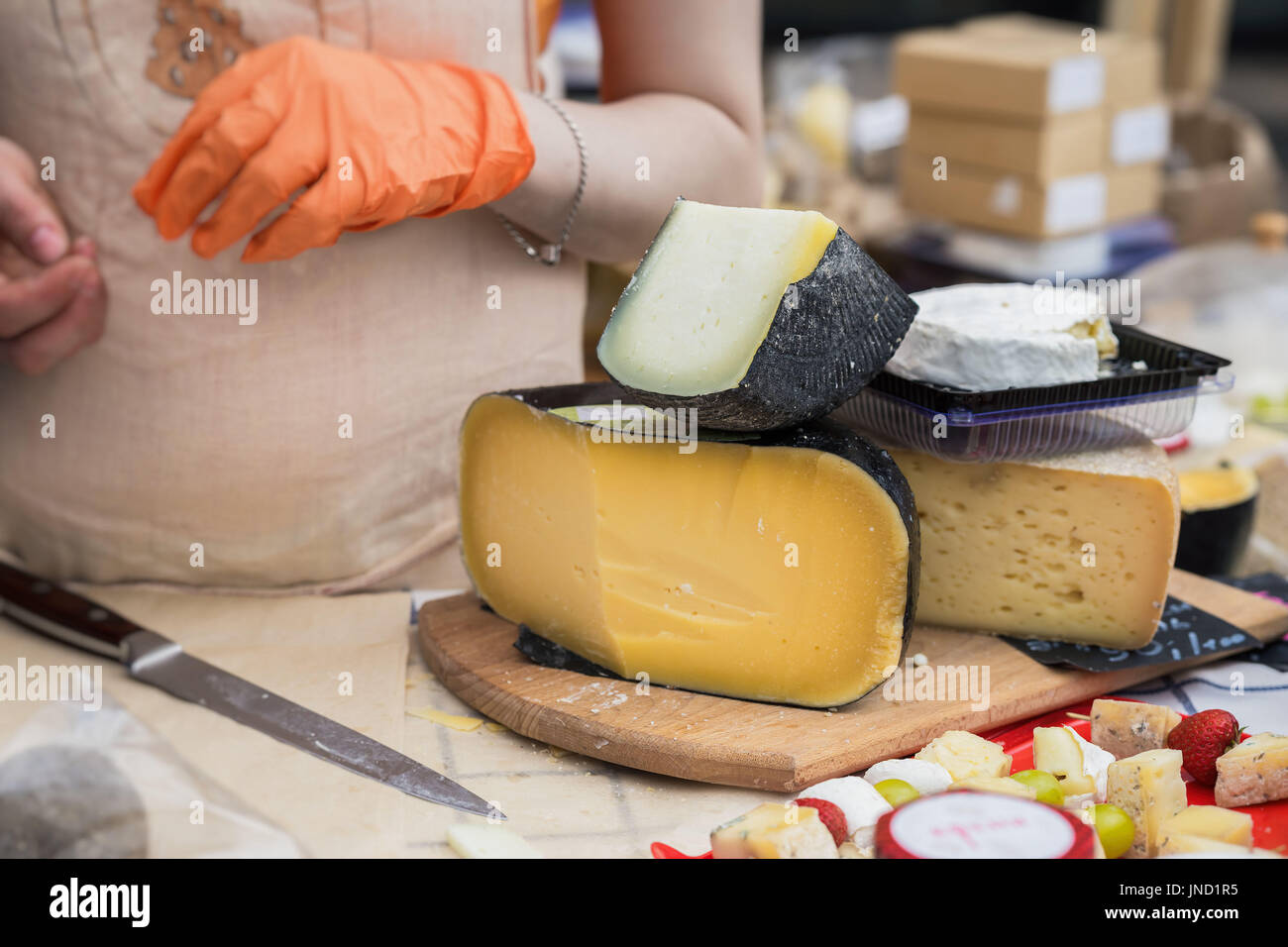 Gastronomic products for gourmets, traditional italian cut cheese heads ...