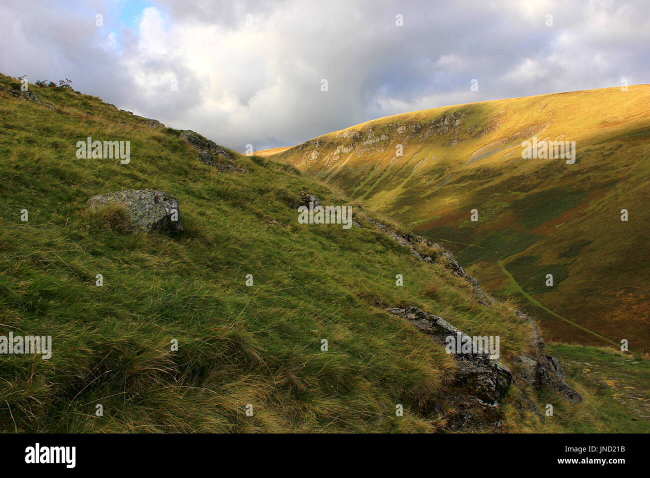 Hillside landscape in Mid-Wales with clouds and sunset lighting Stock ...