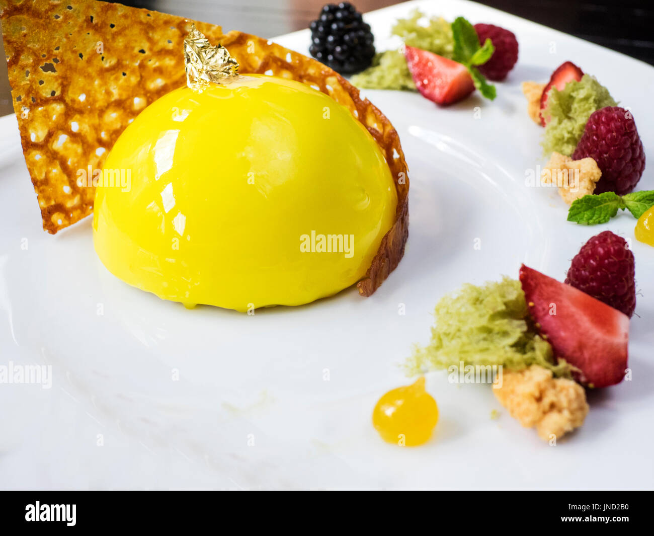Mango parfait with passion fruit twill, and Apperol Shpritz Stock Photo ...
