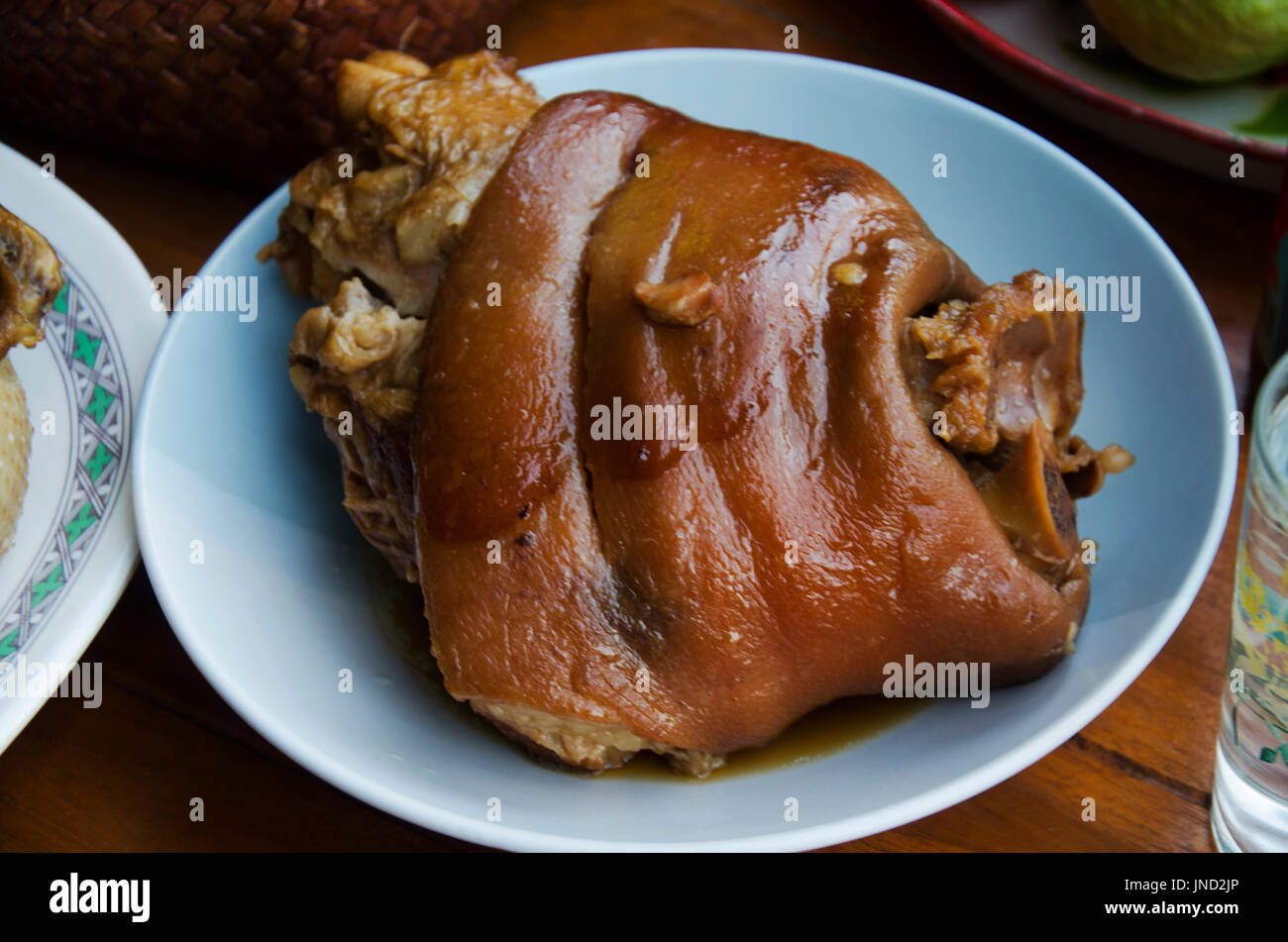 Leg pork stewed in the gravy or leg pork in brown sauce frogs for ...