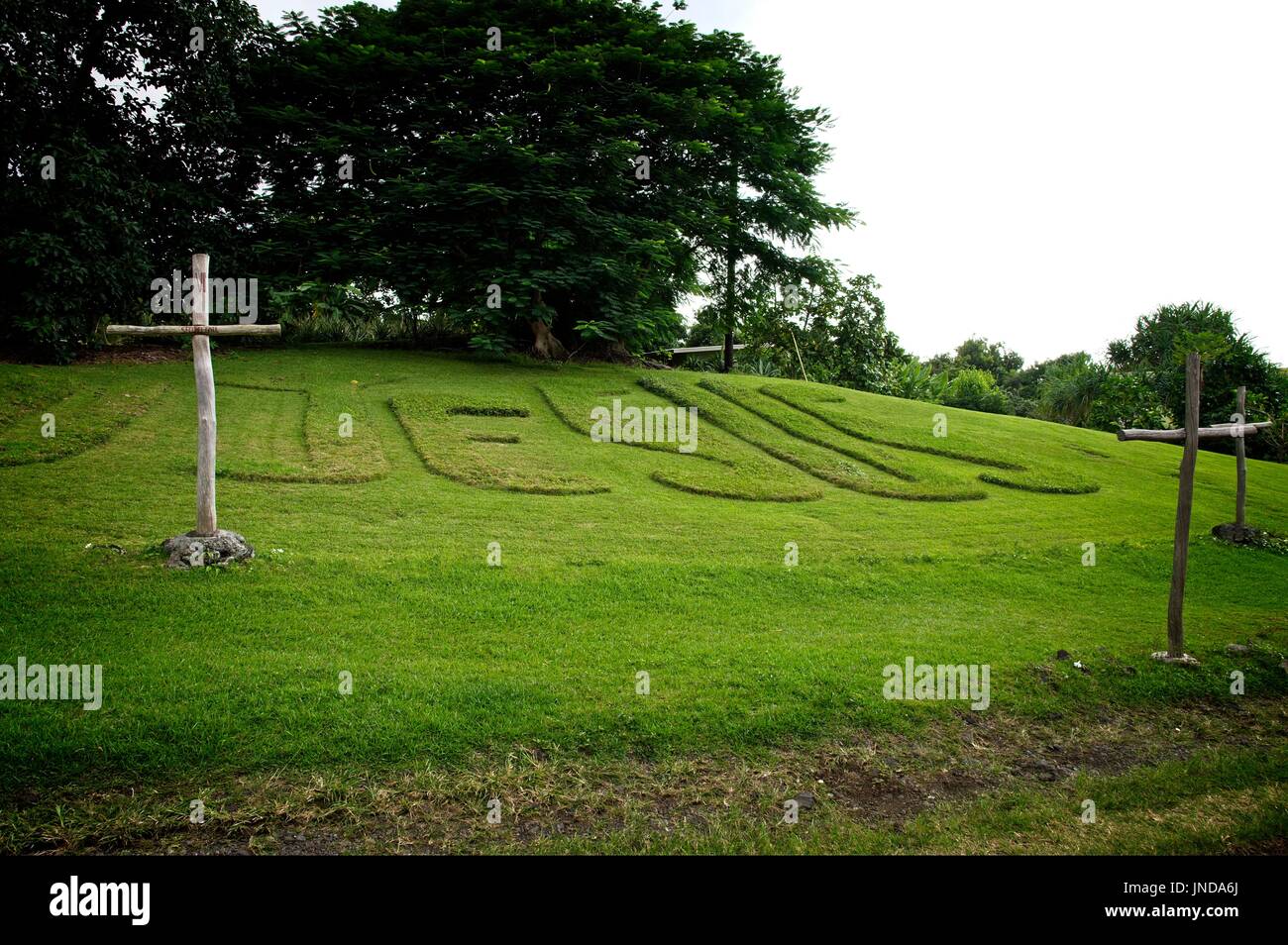Jesus cut into grass on the grounds of the painted church near Captain ...