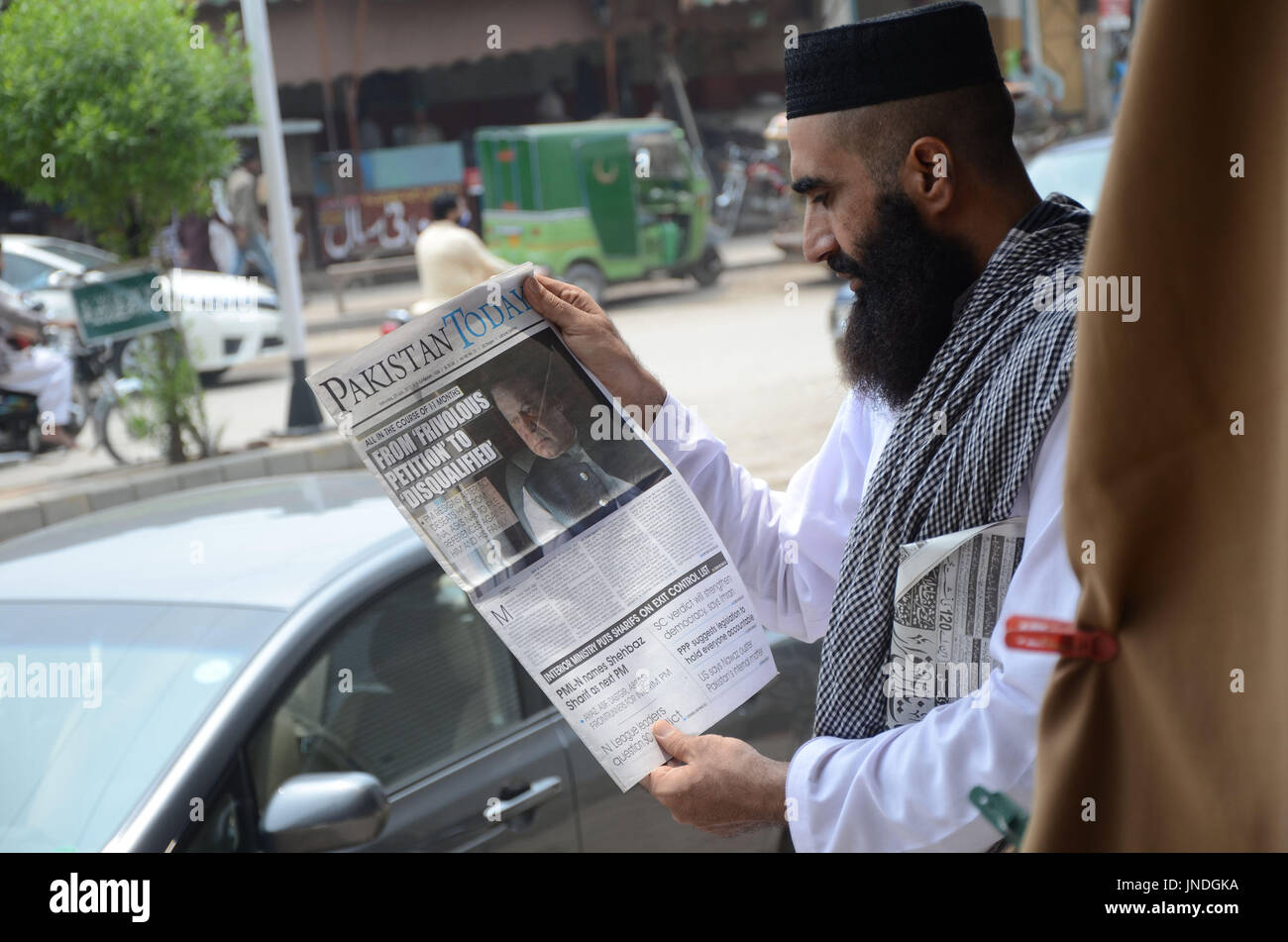 Pakistani newspaper hi-res stock photography and images - Alamy