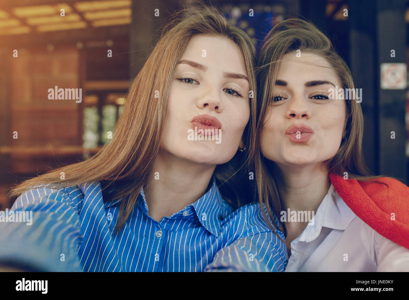 Two women bar terrace hi-res stock photography and images - Alamy