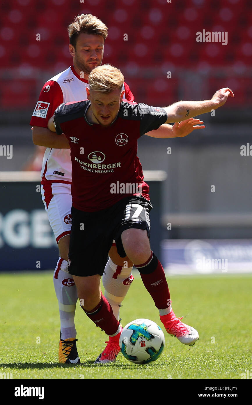 Nuremberg, Germany. 30th July, 2017. Nuremberg's Sebastian Kerk (r) and ...