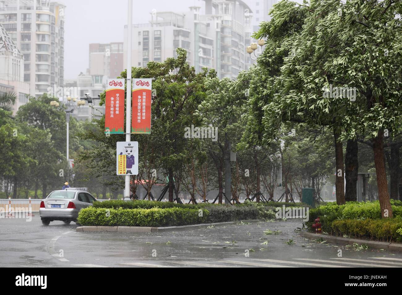 Fuqing, China's Fujian Province. 30th July, 2017. A car runs in rain on ...