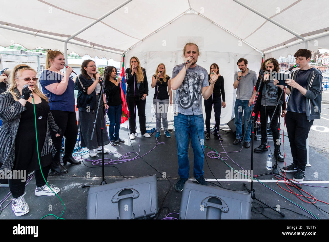 Female and male performing on stage hi-res stock photography and images ...