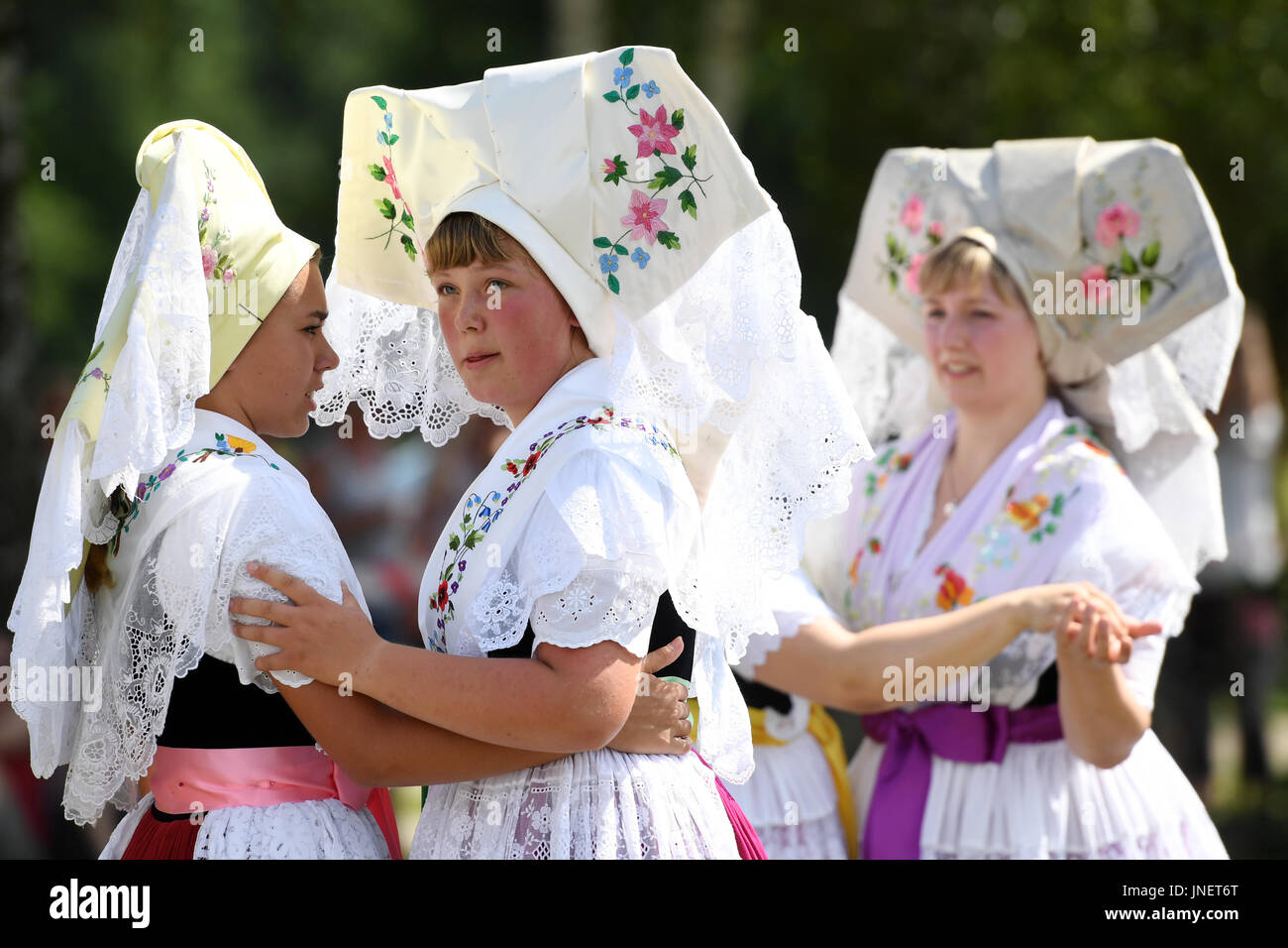 Buch, Germany. 30th July, 2017. dpatop - Women wearing traditional ...