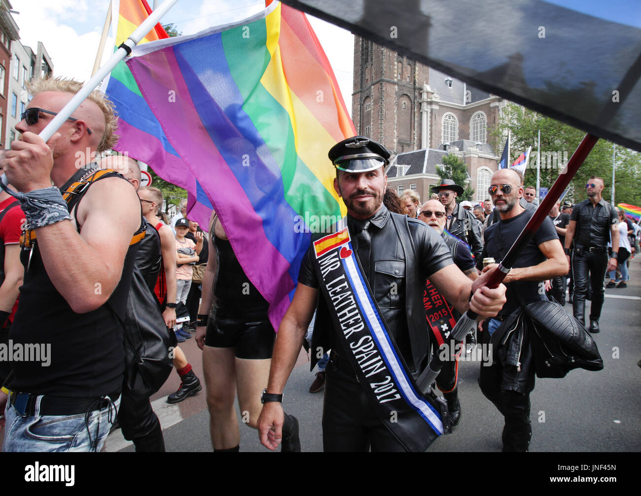 Participants attend the PrideWalk on July 29, 2017 in Amsterdam ...