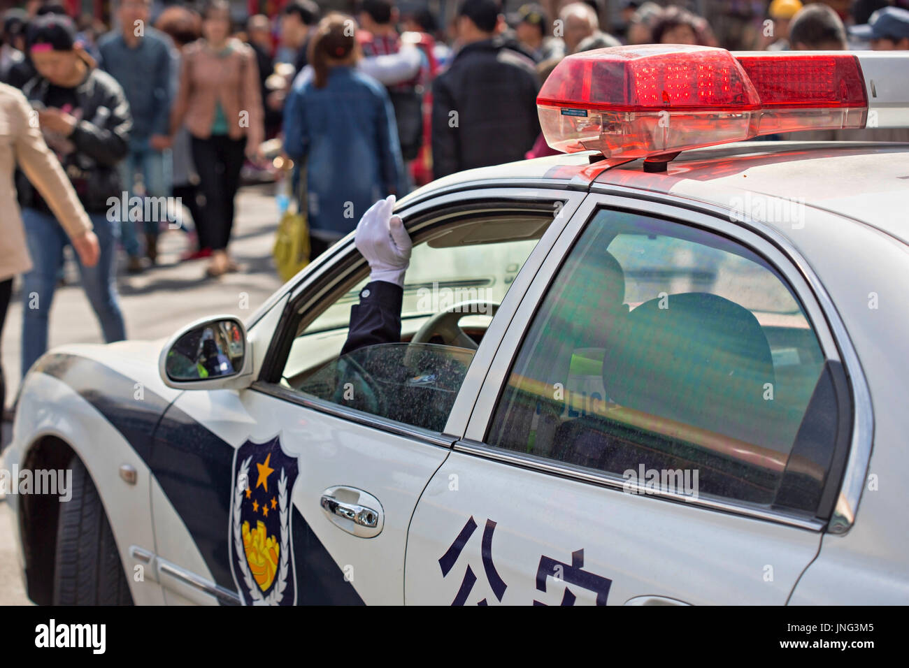 Policeman in uniform & white gloves, Chinese police car, Beijing, China ...