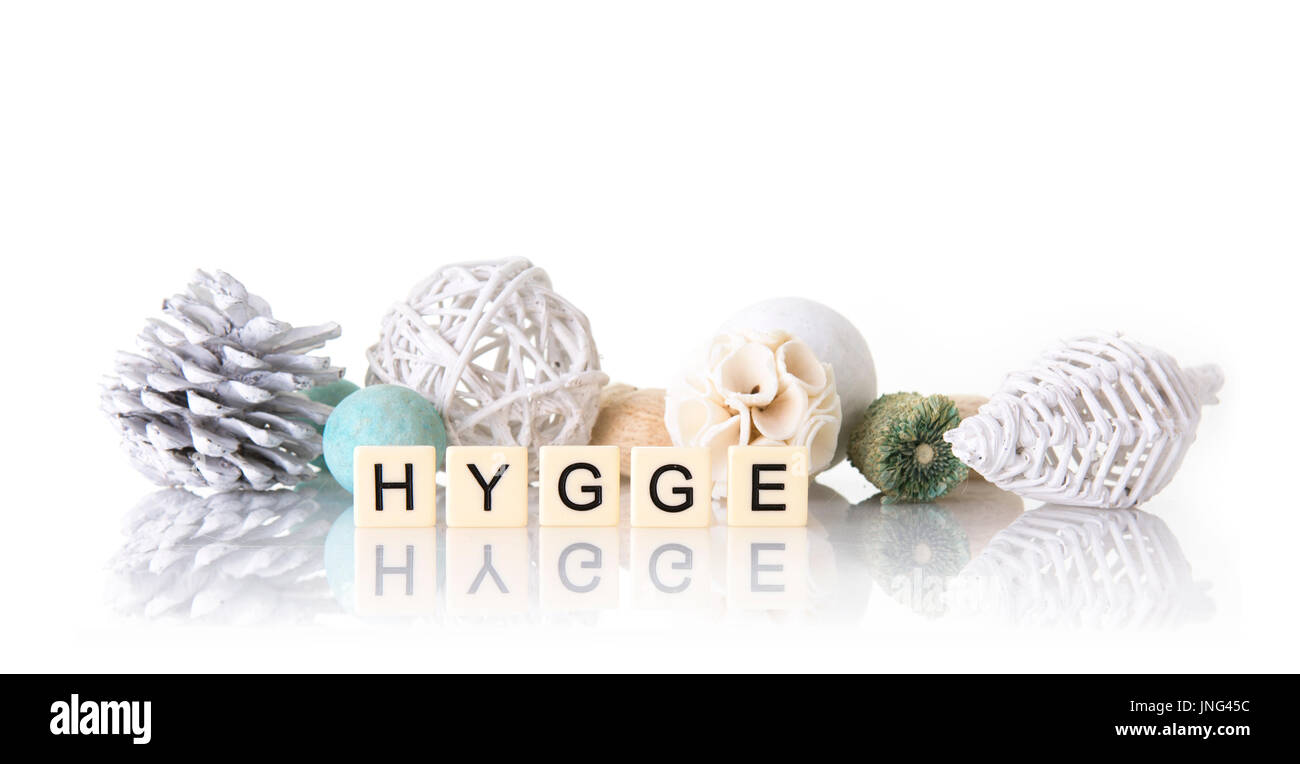 Hygge spelt with word tiles on a simple white background with copyspace ...