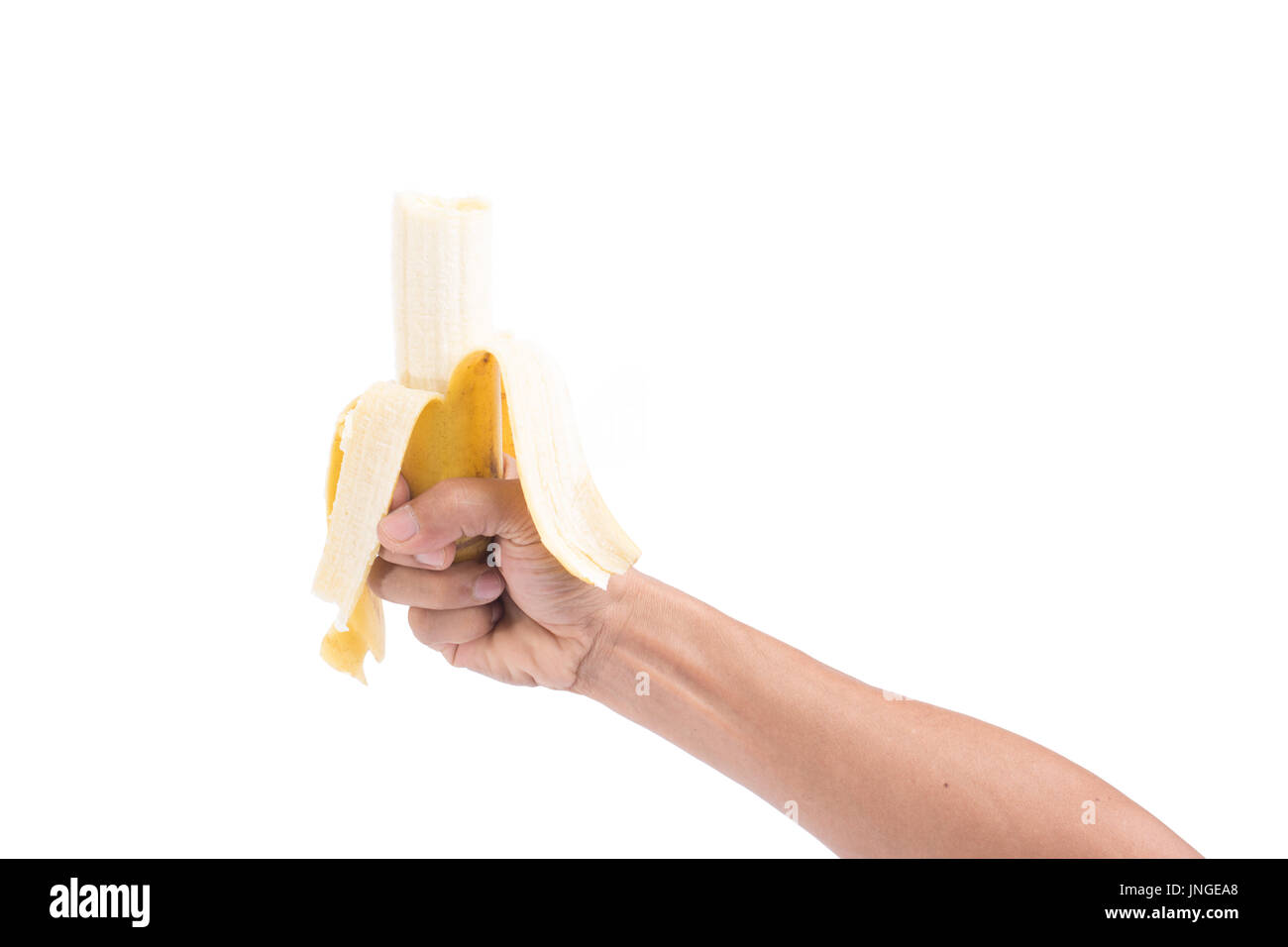 Banana in hand isolated on white background Stock Photo - Alamy
