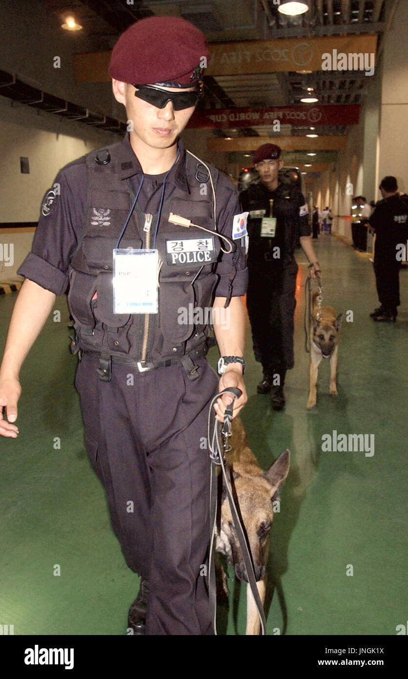 SUWON, South Korea - Police and dogs carry out patrols at Suwom World ...