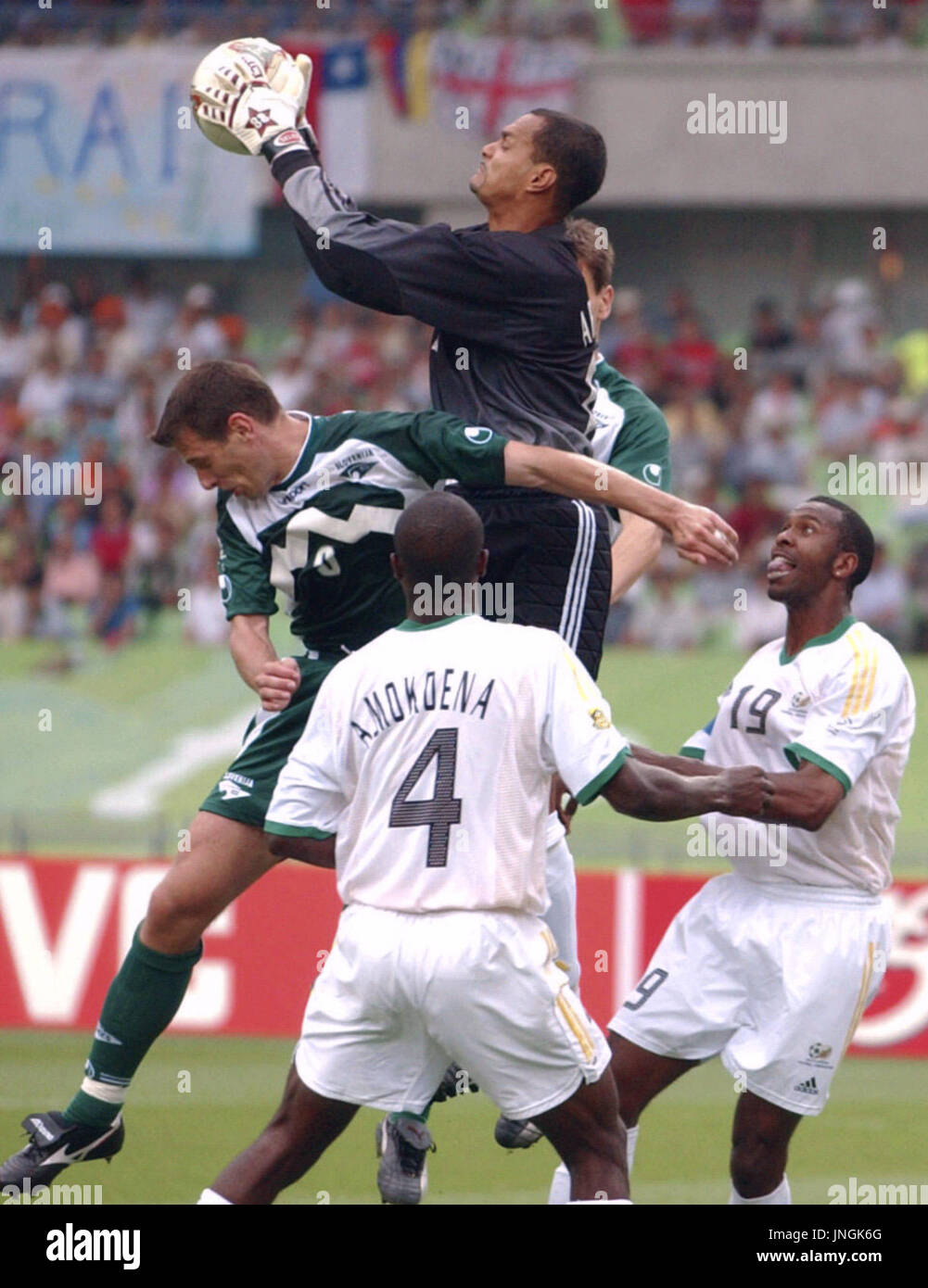 TAEGU, South Korea - South Africa goalkeeper Andre Arendse safely ...