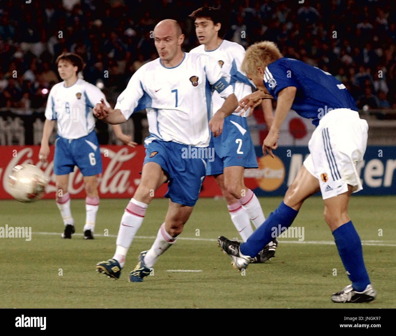 YOKOHAMA, Japan - Japan's Junichi Inamoto (R) scores the opening goal ...
