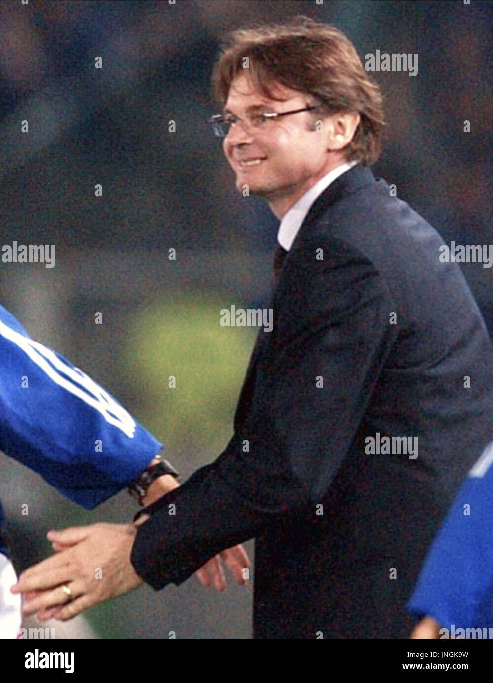 YOKOHAMA, Japan - Japan coach Philippe Troussier in smiles after ...