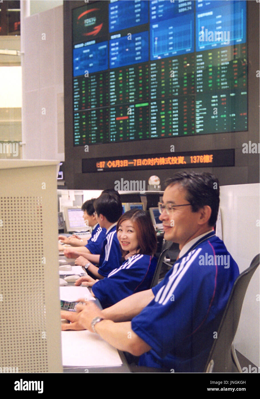 TOKYO, Japan - Traders at the Tokyo Stock Exchange sport Japan's ...