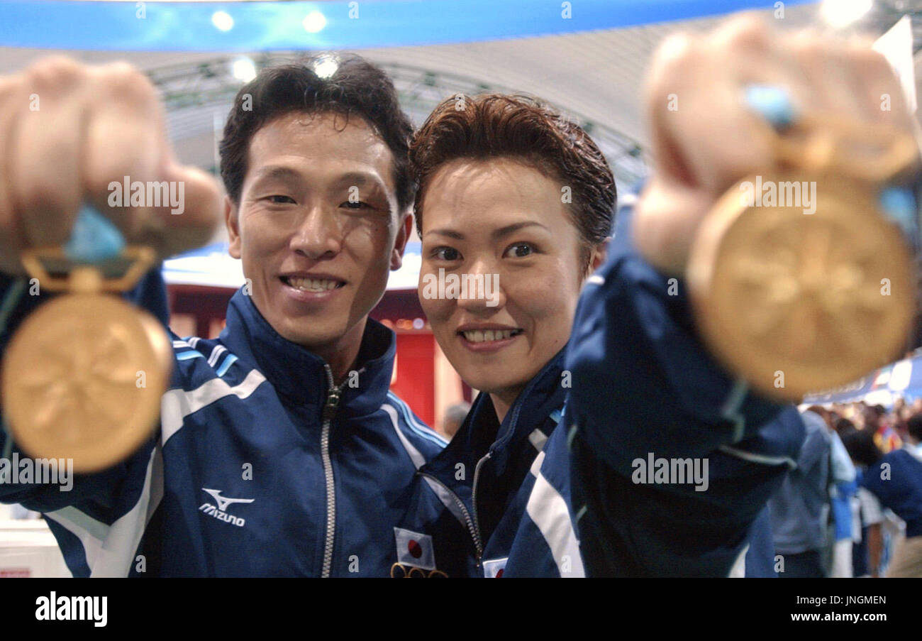 PUSAN, South Korea - Yukimitsu Hasegawa (L) and Atsuko Wakai show off ...