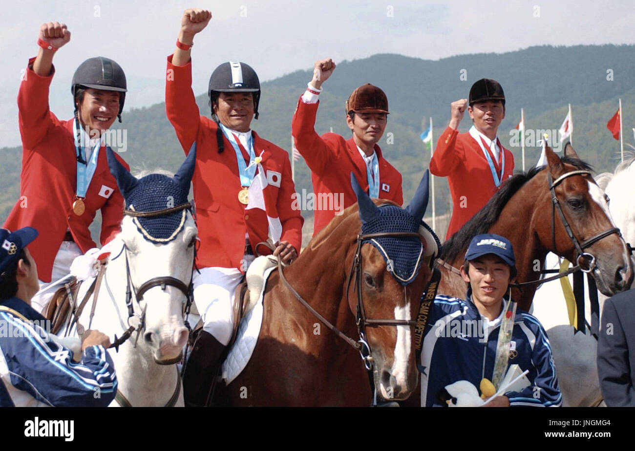 PUSAN, South Korea - Japan wins in the equestrian team jumping in the ...