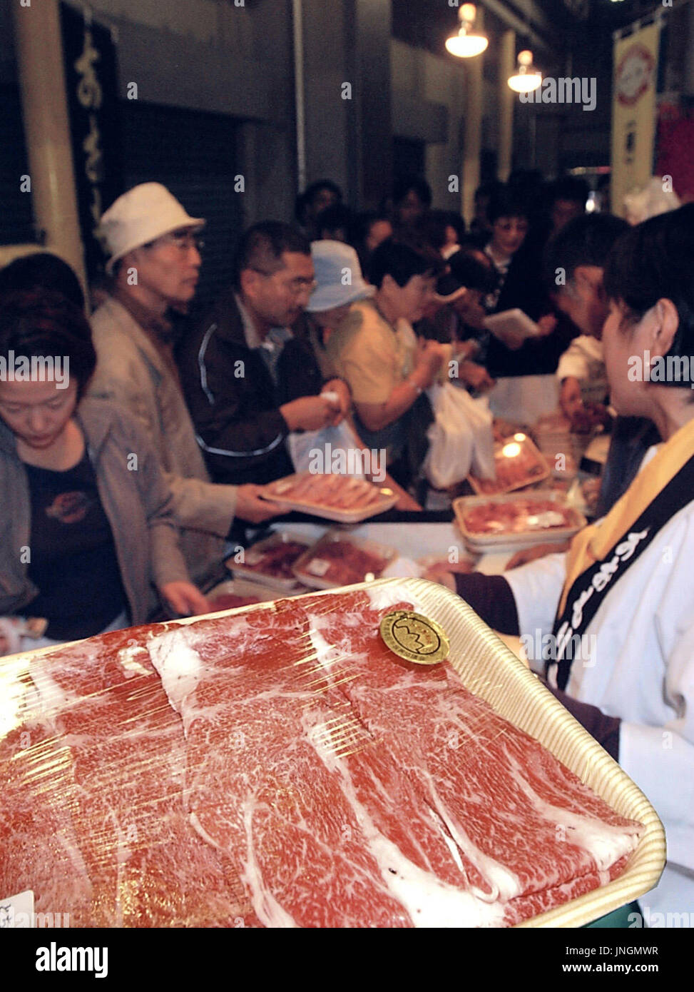 TOKYO, Japan - People crowd a ''meat fair'' which Tokyo's central ...