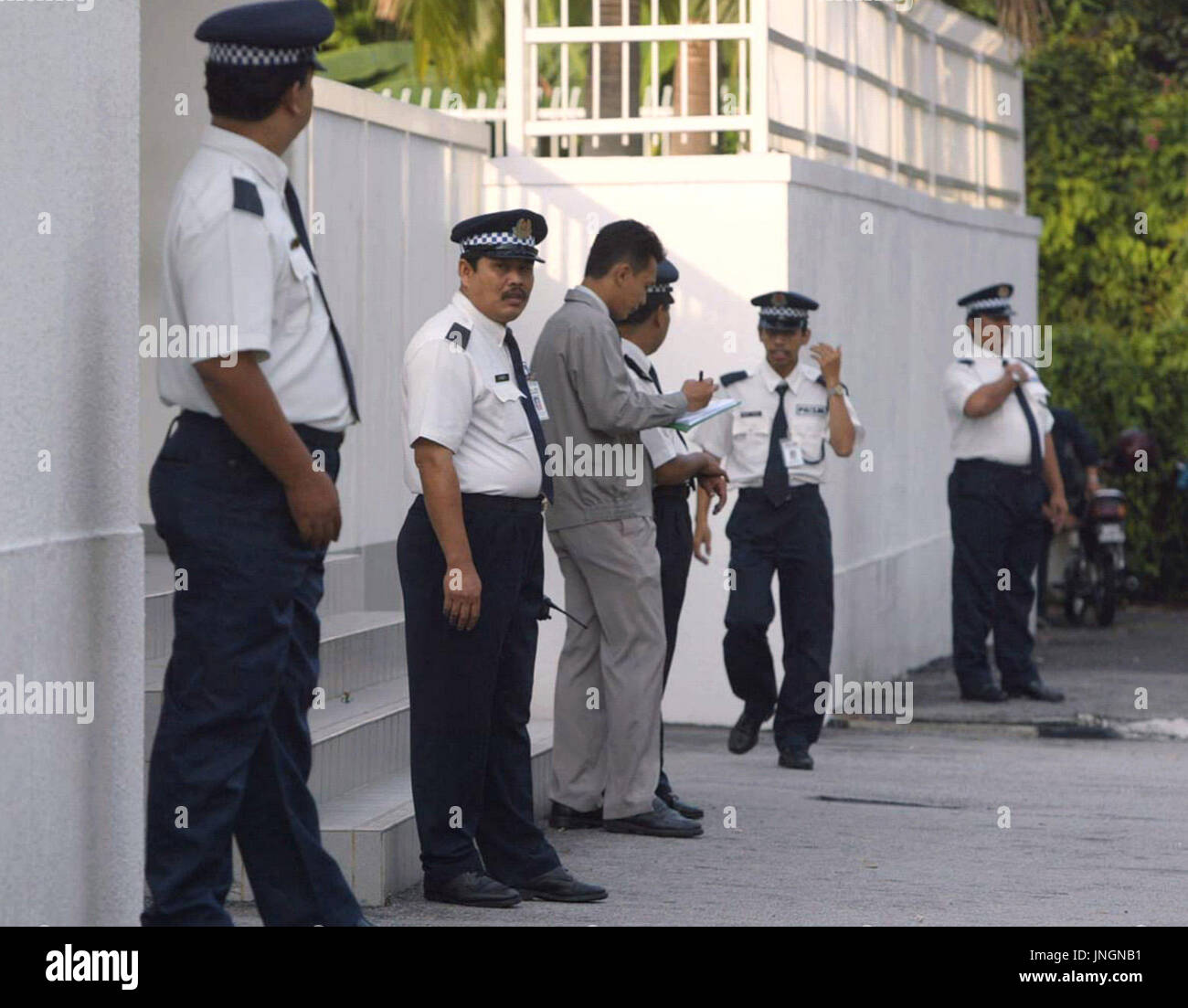 KUALA LUMPUR, Malaysia - Security guards are posted outside the ...