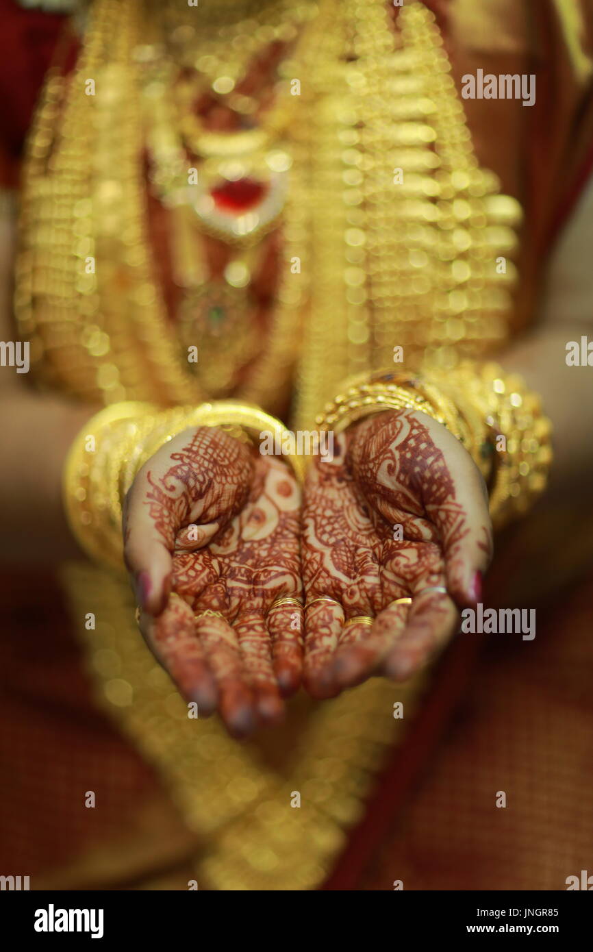 Detail of Indian bride / female wearing traditional decorative gold ...