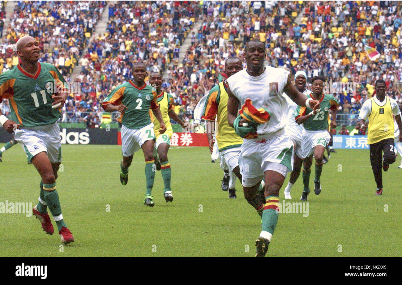 OITA, Japan - Senegal striker Henri Camara celebrates with teammates ...