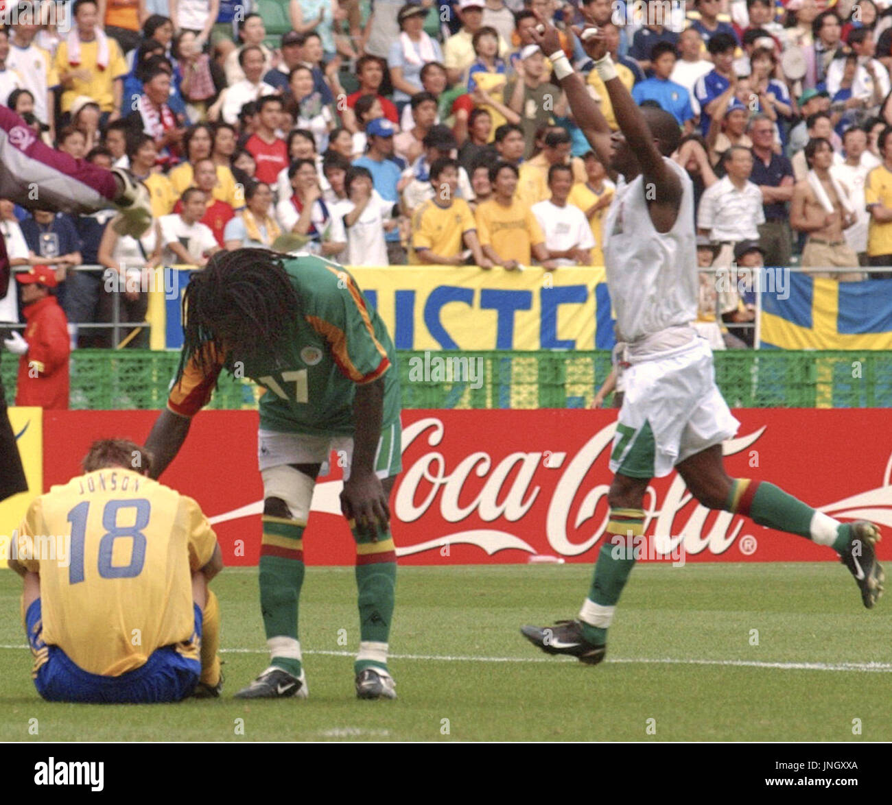 OITA, Japan - Senegal striker Henri Camara celebrates after scoring the ...