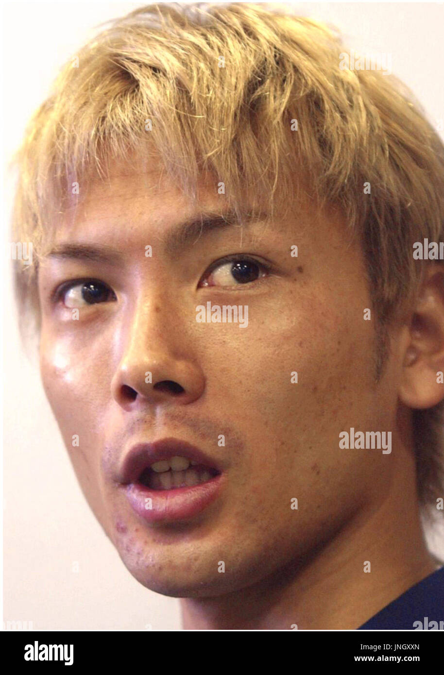 MORI, Japan - Japan striker Takayuki Suzuki speaks to the media at ...