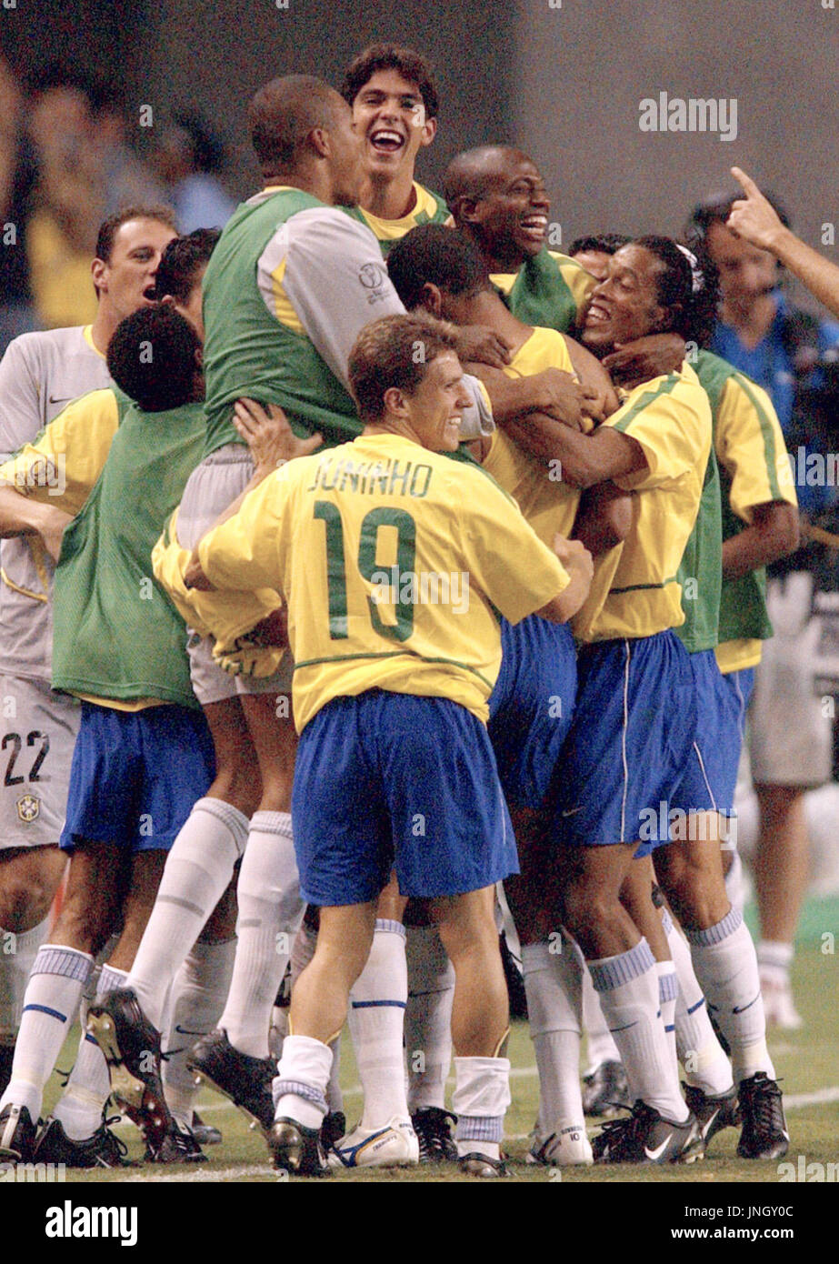 KOBE, Japan - Brazilian players mob Rivaldo after he scored the opening ...