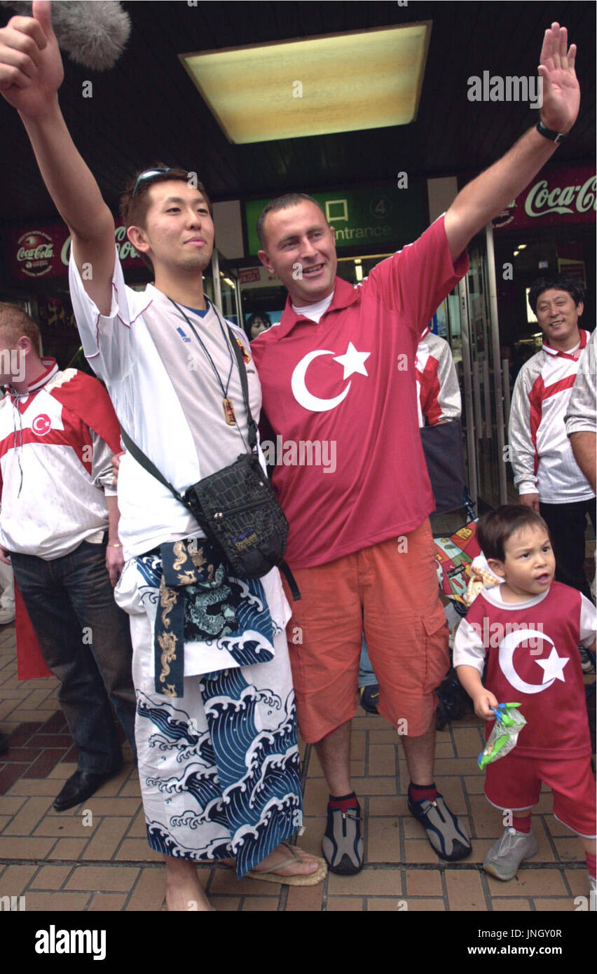 SENDAI, Japan - Japanese and Turkish supporters pose together for a ...
