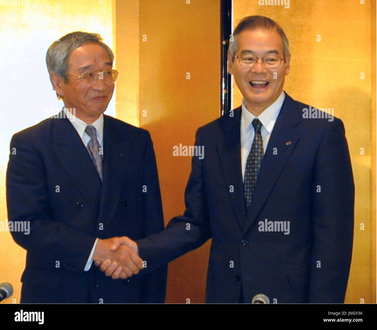 TOKYO, Japan - Tadashi Okamura (L), president of Toshiba Corp., and ...