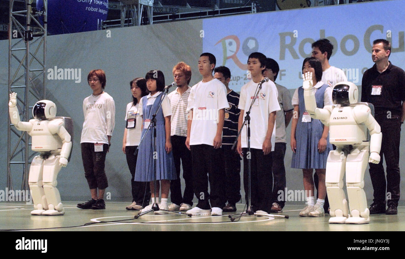FUKUOKA, Japan - Two Honda Motor Co. ASIMO robots join an opening ...
