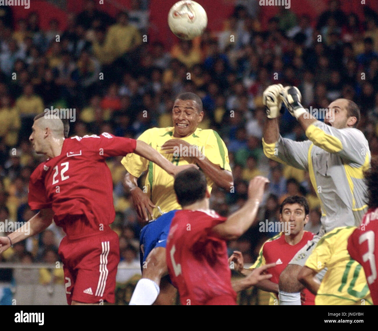 SAITAMA, Japan - Brazil goalkeeper Marcos battles for an air ball ...