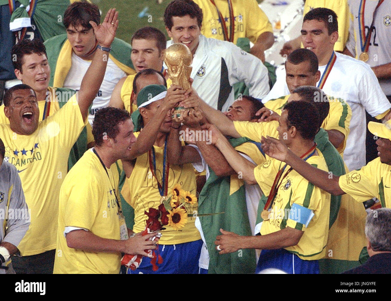 YOKOHAMA, Japan - Brazil players hold up the World Cup after beating ...