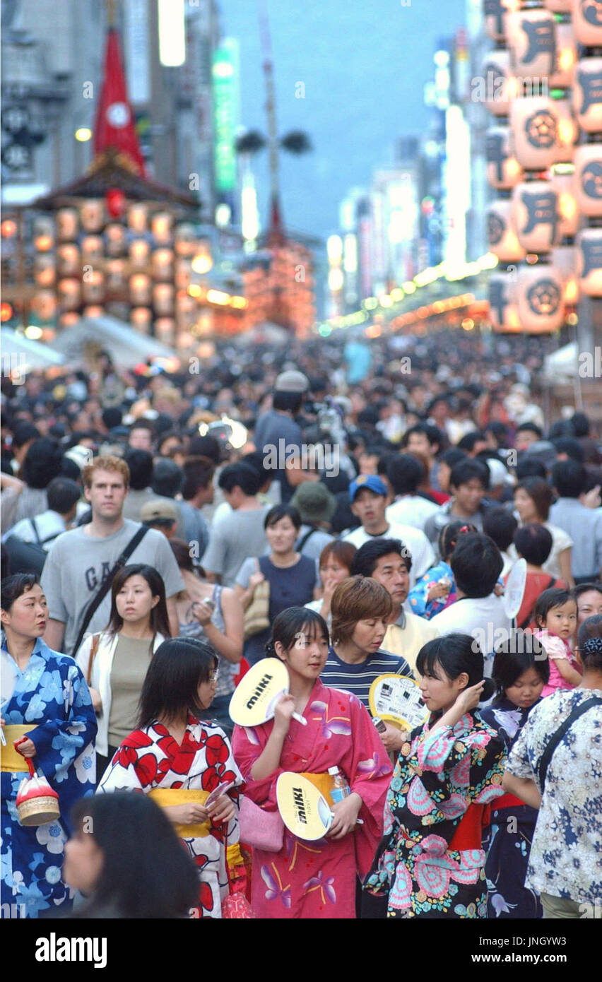 KYOTO, Japan - People crowd the streets of Kyoto on July 16 on the eve ...