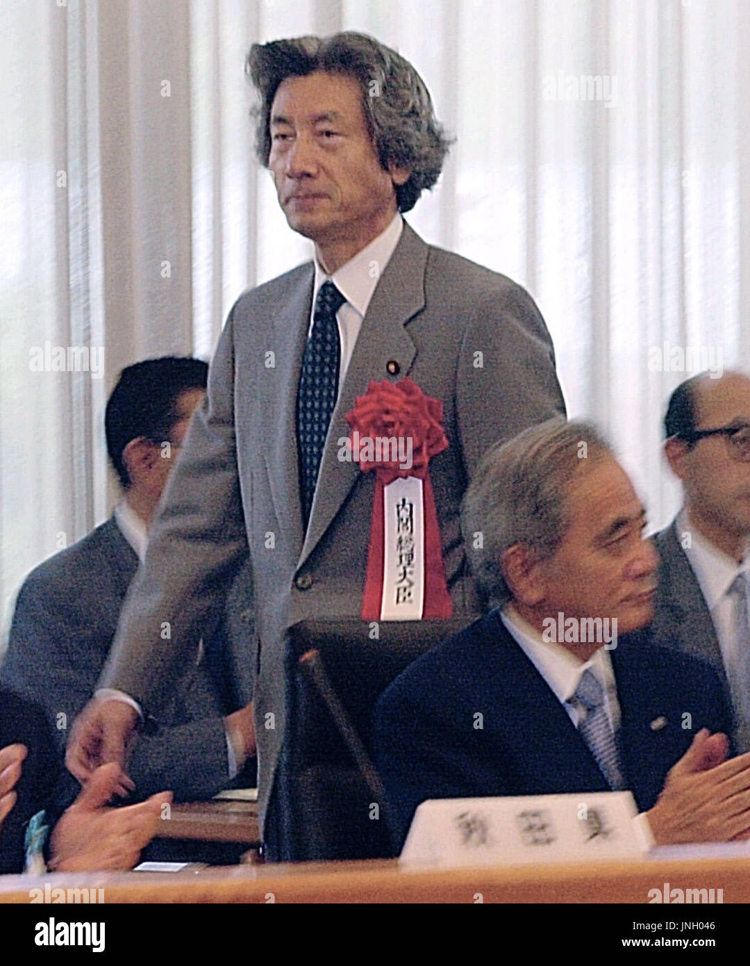 TOKYO, Japan - Prime Minister Junichiro Koizumi enters a meeting of ...