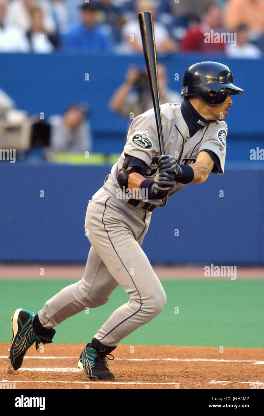 TORONTO, Canada - Seattle Mariners Ichiro Suzuki hits a single to ...
