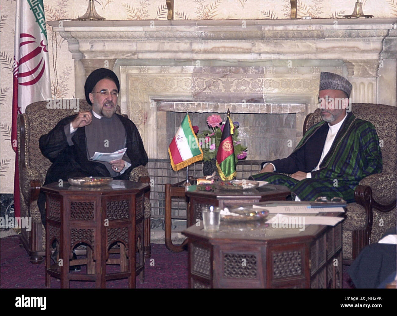 KABUL, Afghanistan - Afghan President Hamid Karzai (R) talks with ...