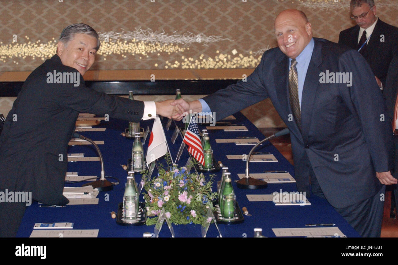 TOKYO, Japan - Japanese Vice Foreign Minister Yukio Takeuchi (L) and U ...